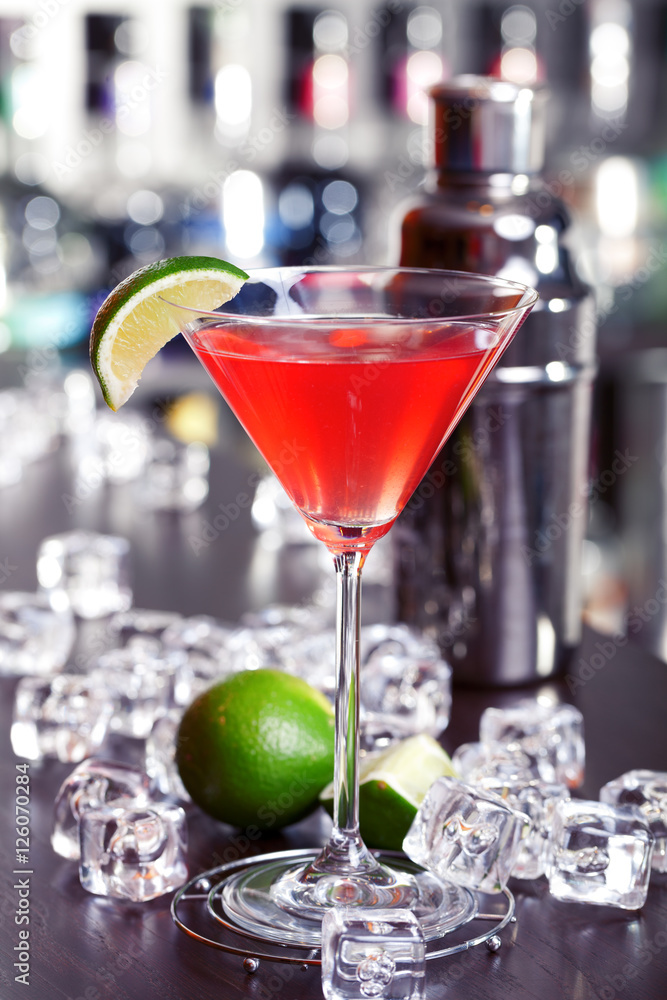 Cosmopolitan cocktails shot on a bar counter in a nightclub. Ful Stock ...