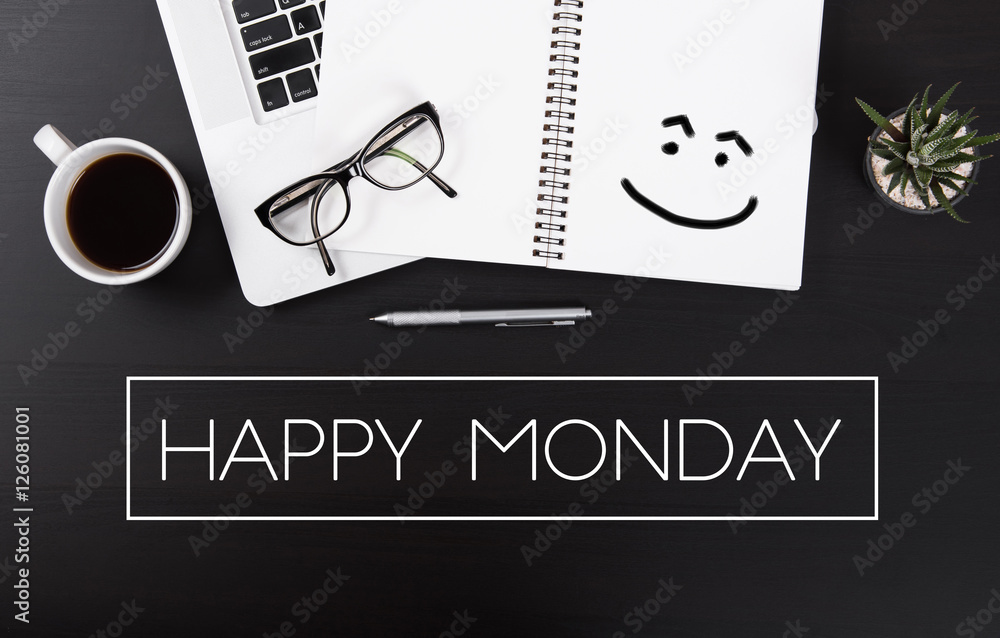 Office desk with notebook computer and wording Happy monday.Top View ...