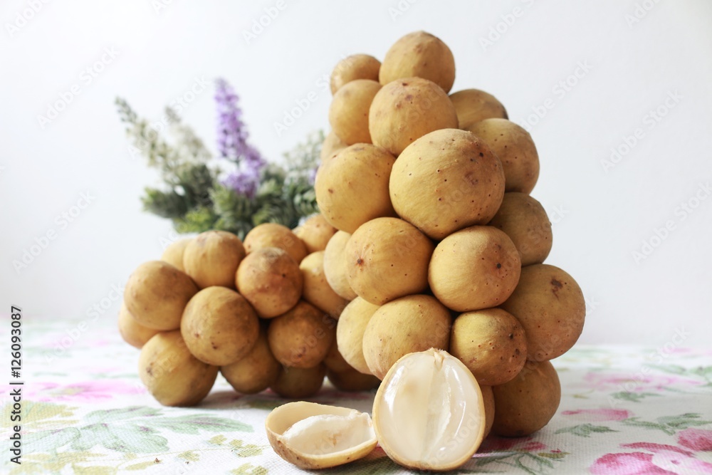 Lansium parasiticum, langsat, longkong or duku. Tropical fruit on half ...