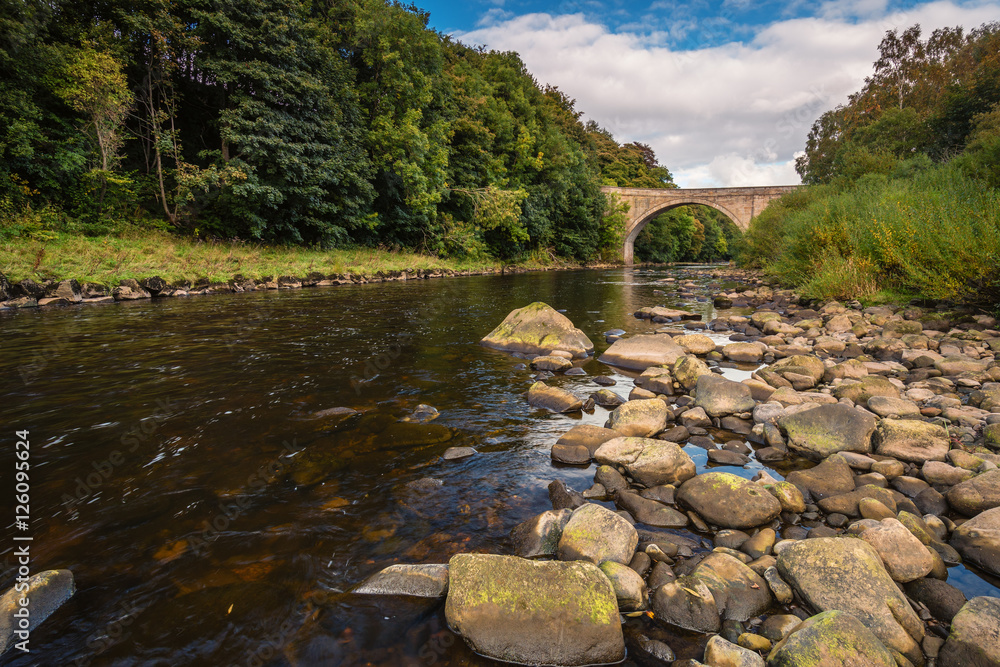 Ridley Bridge over River South Tyne, which is a stone arch road bridge ...
