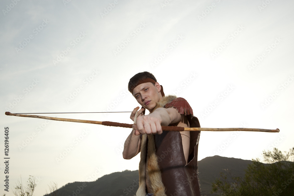 Robin Hood. Archer with arrow and long bow Stock Photo | Adobe Stock