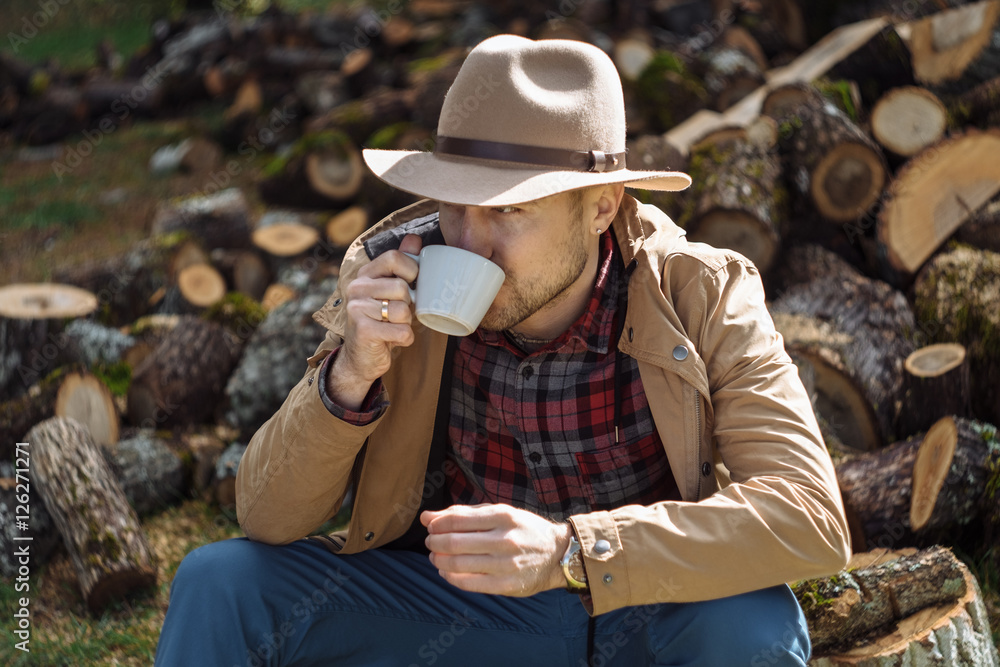 Man cowboy hat drinking morning coffee in countryside Stock Photo ...