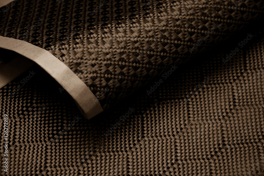 Carbon fiber composite raw material background Stock Photo | Adobe Stock