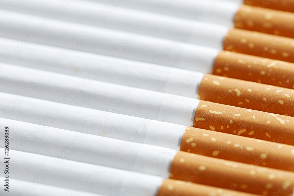 Tobacco cigarettes background Stock Photo | Adobe Stock