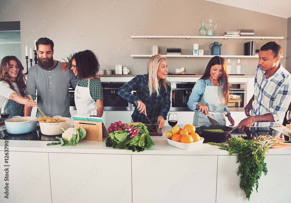 Six mixed Black and Caucasian friends cooking food Stock Photo | Adobe ...