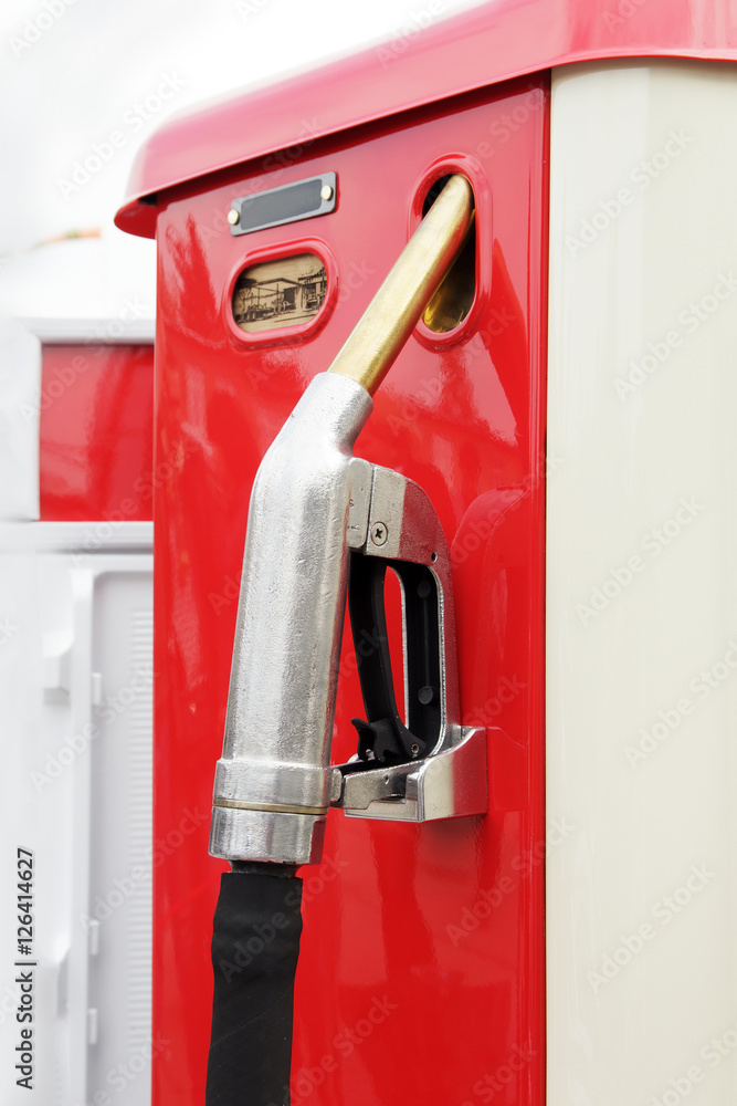 VIntage car refueling. Close-up old red gas pump. Traveling concept ...