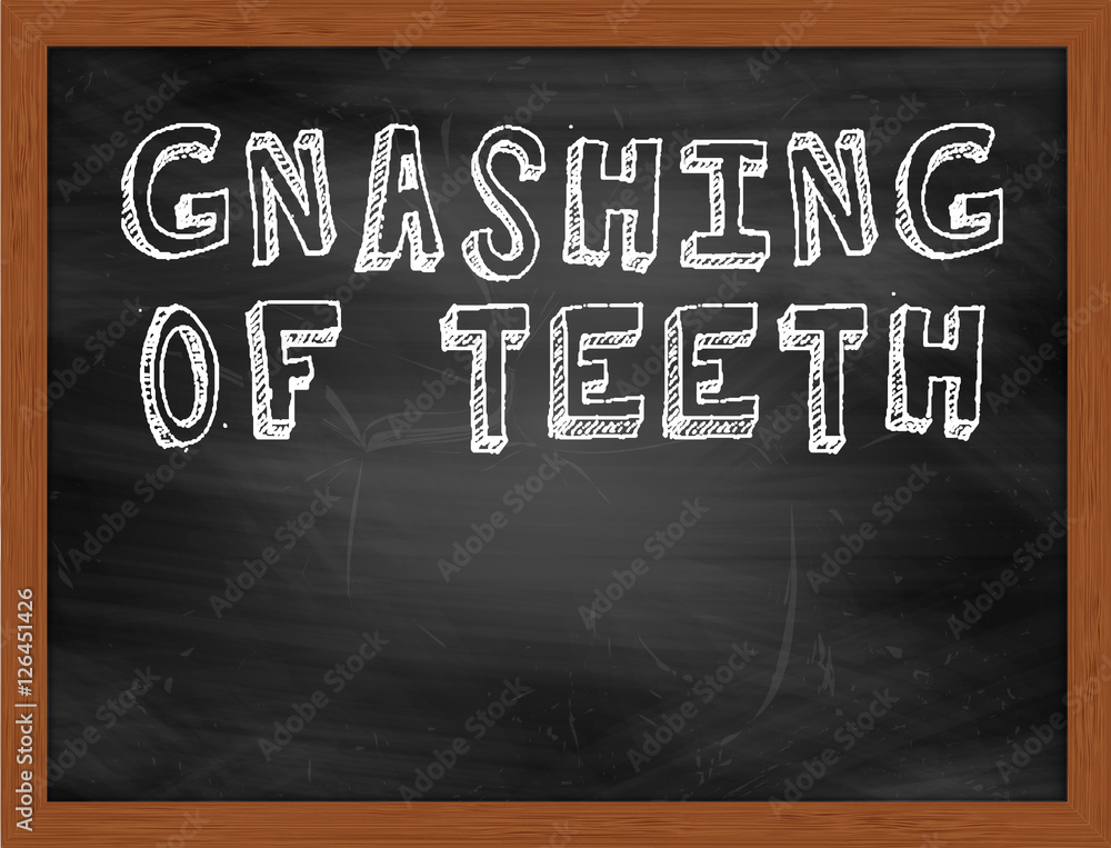 GNASHING OF TEETH handwritten text on black chalkboard Stock ...
