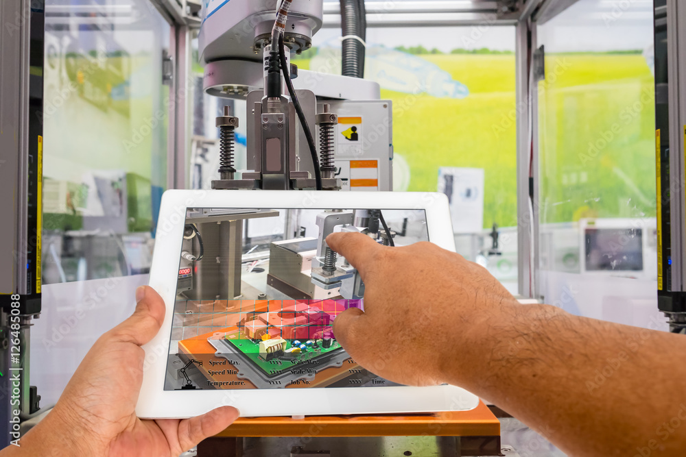 Industry 4.0 and Augmented reality for industry concept. Hand holding ...
