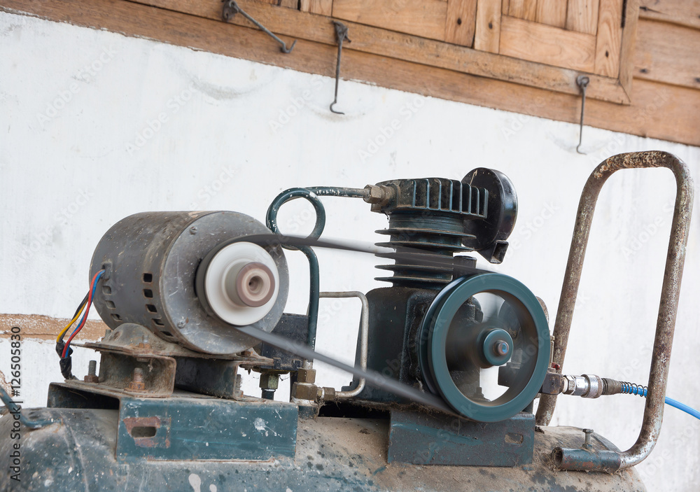 THE OLD AIR-PUMP ENGINE ON WORKING AT THE OLD HOUSE-RENOVATING Stock ...