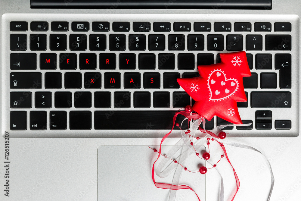 merry christmas in keyboard of computer Stock-Foto | Adobe Stock