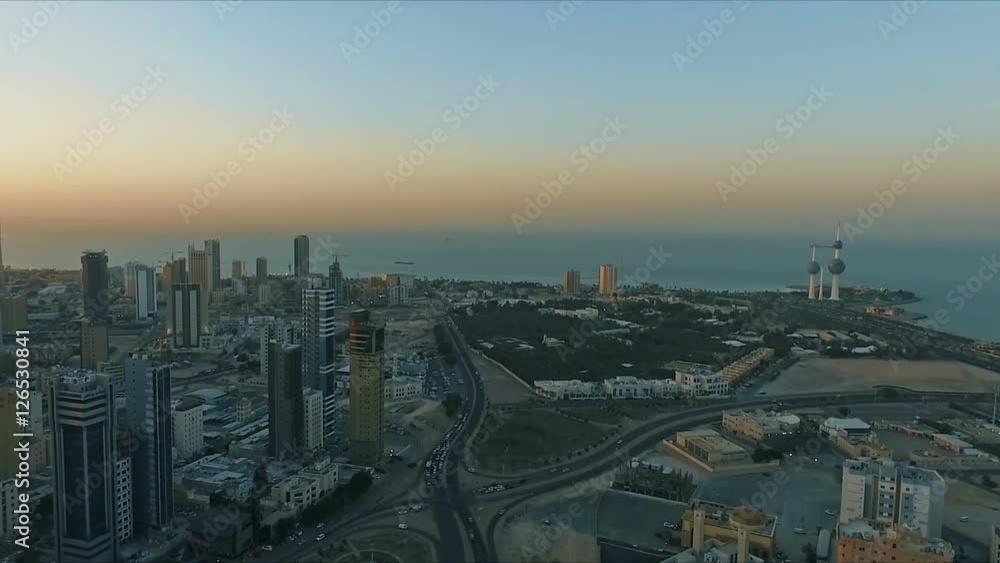Kuwait skyline at sunset. Some famous places in Kuwait shooting from ...