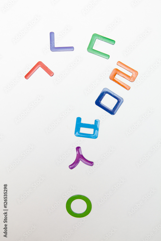 colorful korean alphabet letters which are put as question mark on ...