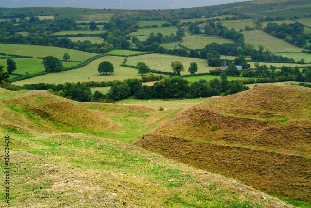motte and bailey castle prehistoric earthwork Stock Photo | Adobe Stock