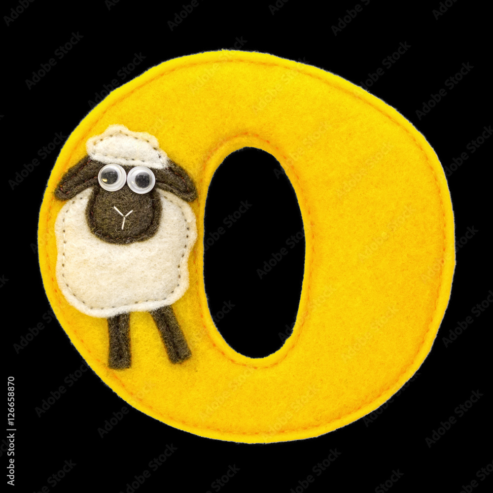 Letter O of the alphabet made of yellow felt isolated on black ...