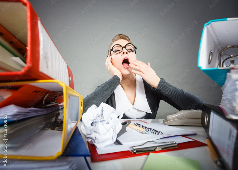 Foto Stock Bored office employee at work. | Adobe Stock