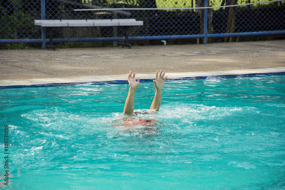 Hand in pool water asking for help Failure and rescue concept Stock ...