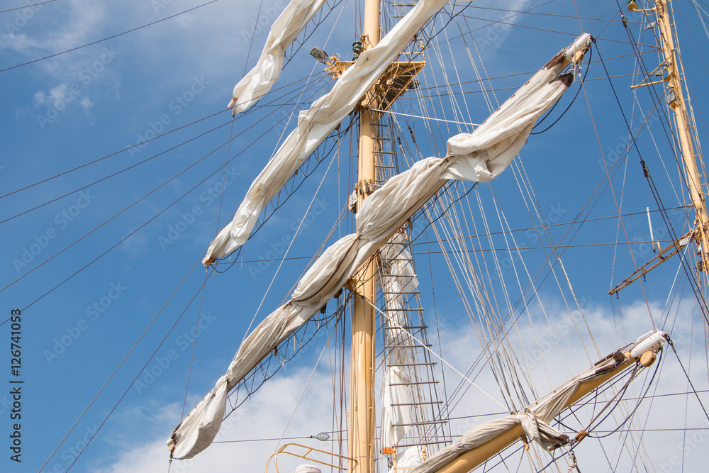 Tall ship rigging mast detail. Vintage sailing ship mast and tackle and ...
