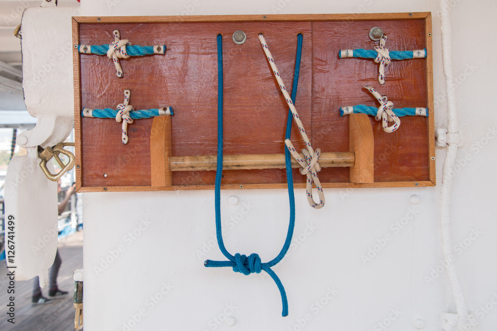 Different types of sea knots rigging on wooden board on tall ship Stock ...
