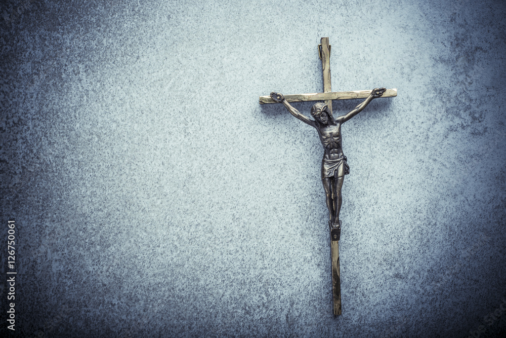 Crucifix of Jesus on the cross with stone background. Symbol of ...