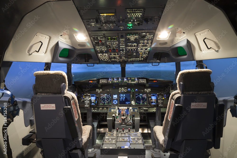 Cockpit of plane in flight simulator Stock Photo | Adobe Stock