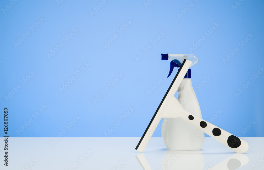 Cleaning product concept blue gradient background with accessories ...