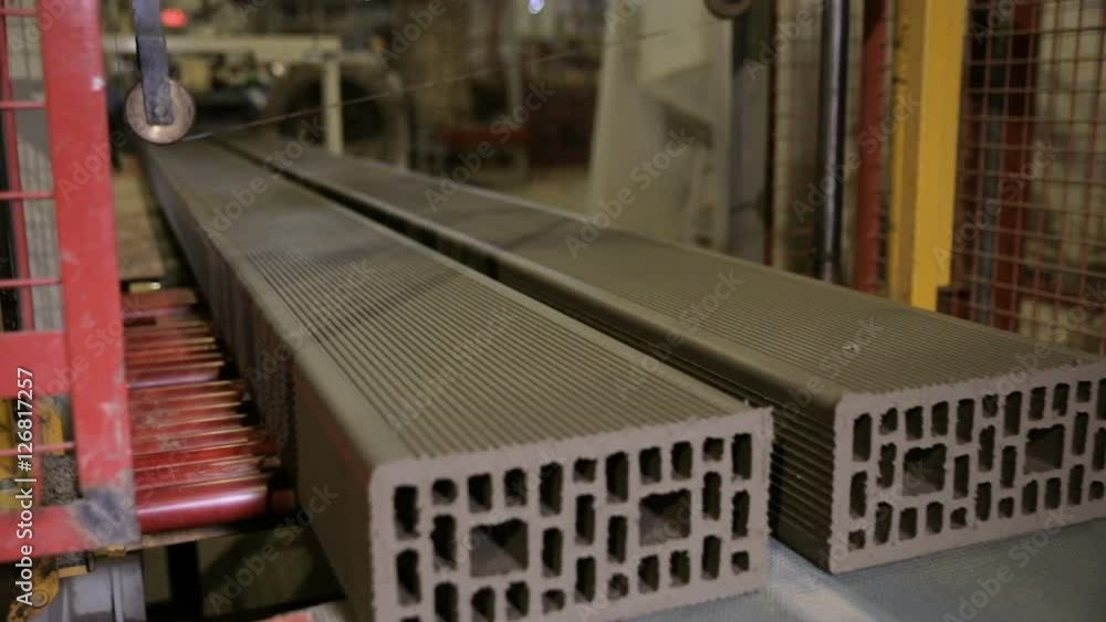 Building blocks, bricks production. Conveyor with building bricks at a ...