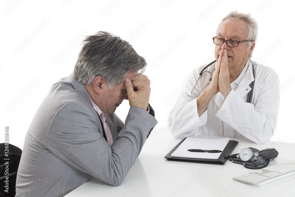 doctor talking to depressive male patient at office 스톡 사진 | Adobe Stock