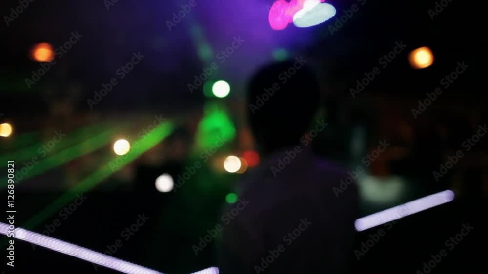 MH Flashing Lights on People Dancing in Nightclub / Singapore Stock ...
