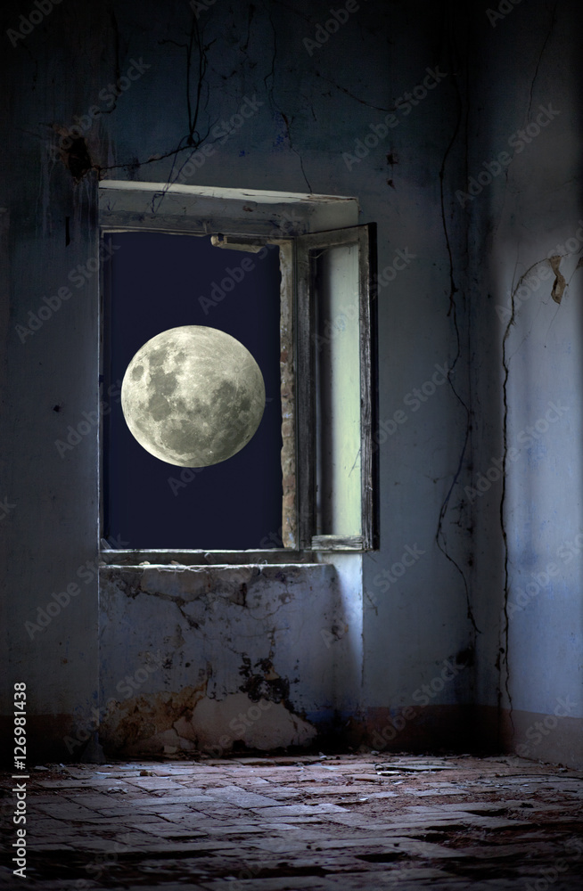 Fantastic view of a moon through a window of the abandoned house Stock ...