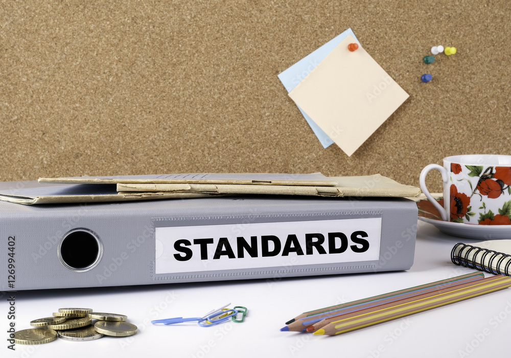 Standards - folder on white office desk. Stock-Foto | Adobe Stock