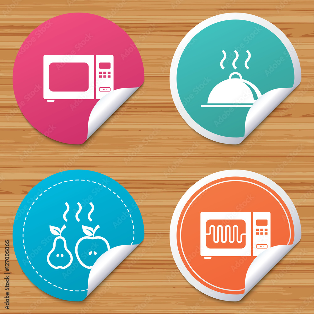 Round stickers or website banners. Microwave grill oven icons. Cooking ...