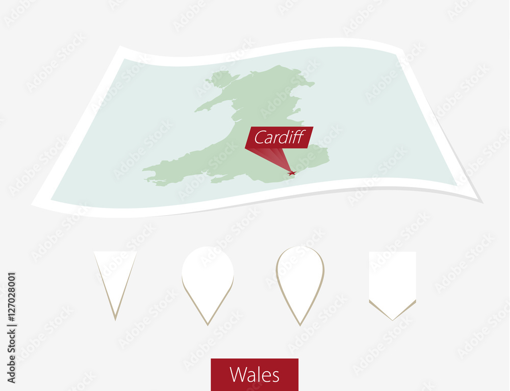 Curved paper map of Wales with capital Cardiff on Gray Background ...