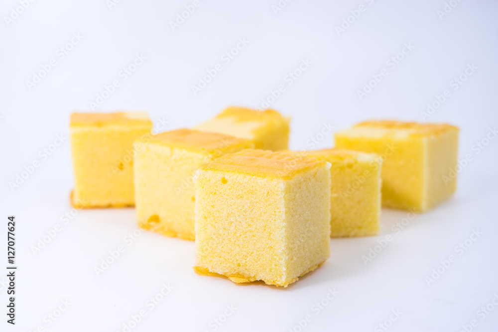 square butter cake on white background. square butter cake stack ...