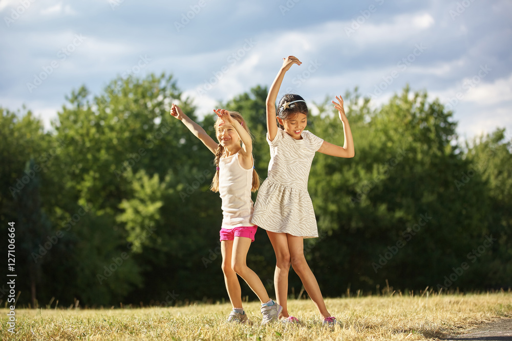 Two girls dancing Stock Photo | Adobe Stock