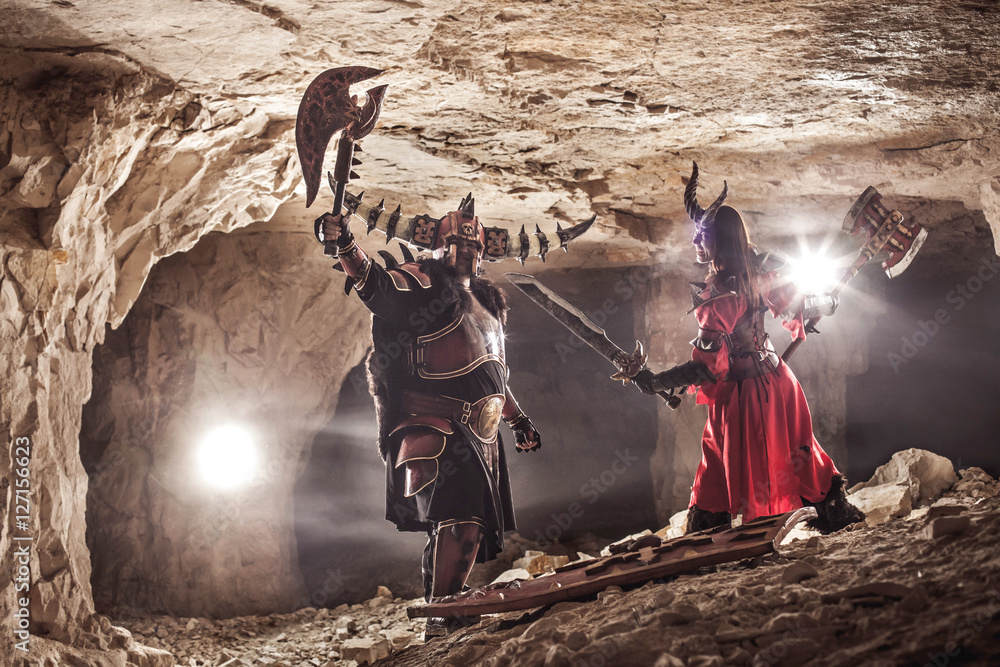Battle of powerful knights in heavy armor in the Forbidden Caves Stock ...