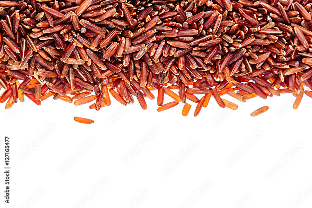 Border of red rice close-up on white background. Isolated. Decorative ...