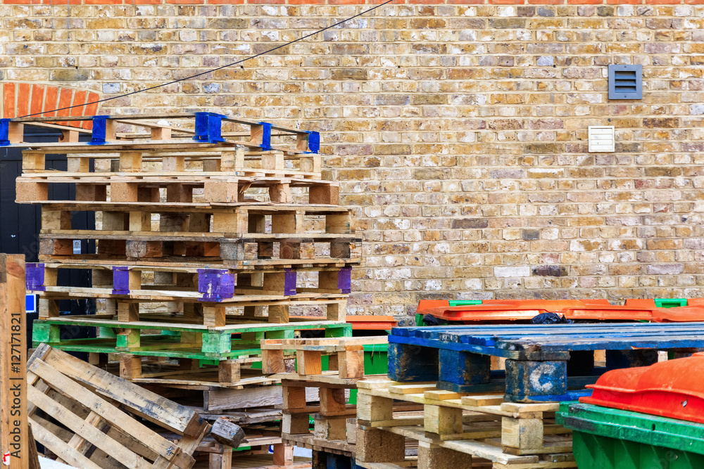 Pile of wooden pallets at a recycling yard Stock Photo | Adobe Stock
