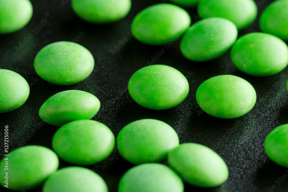 Green Tablets Or Drugs Circular Shape On A Black Background Stock Photo ...