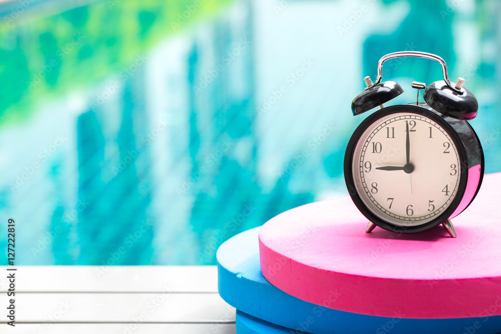 swimming times, retro black bell clock time at 9 o'clock at swimming ...