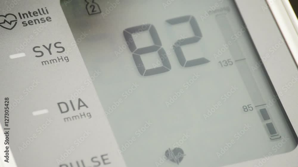 Digital tensiometer screen measuring arterial tension Stock Video ...
