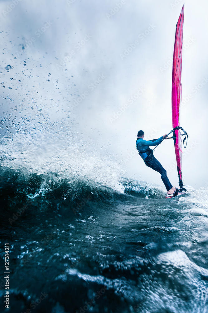 windsurfer at high speed surfing towards the horizon Stock-Foto | Adobe ...
