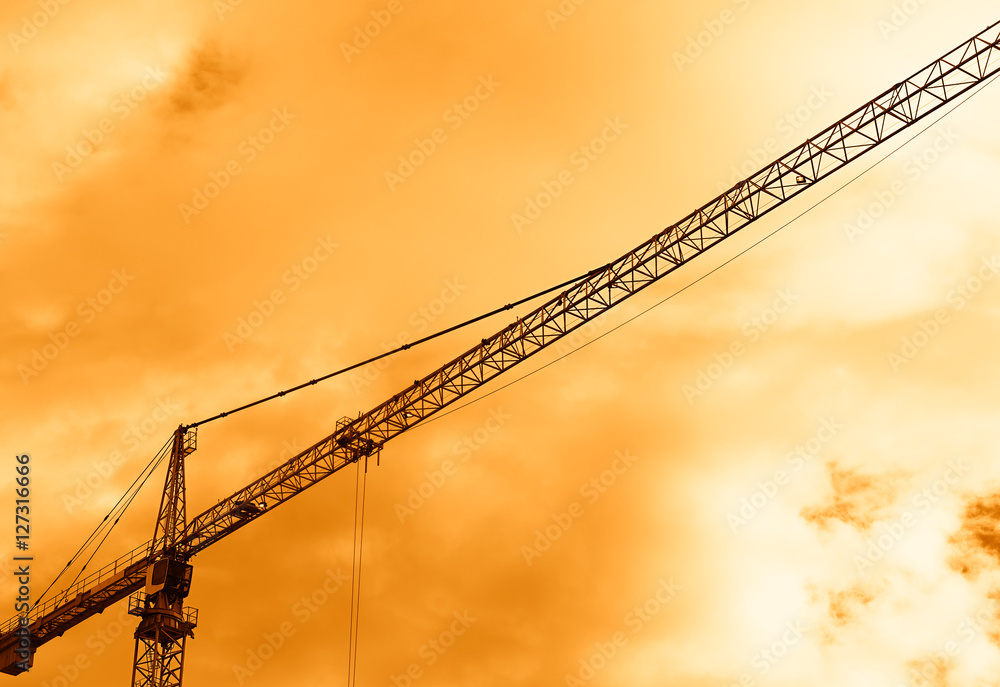 Industrial crane sunset background Stock Photo | Adobe Stock