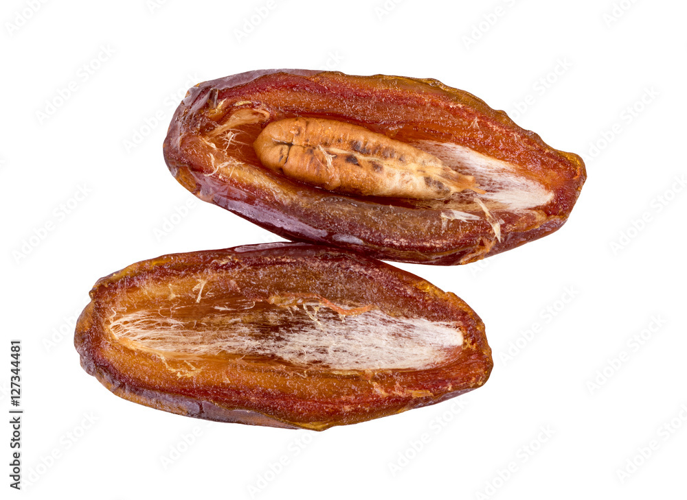 dried dates half two halves on white Stock-Foto | Adobe Stock