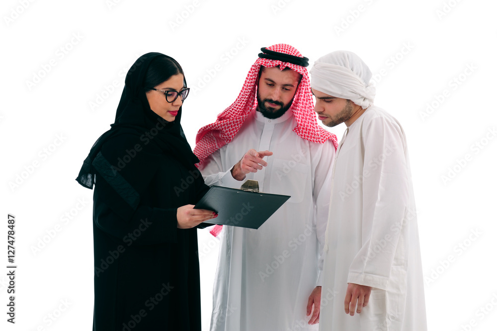 Arabian business Team in a meeting, three business people standing over ...