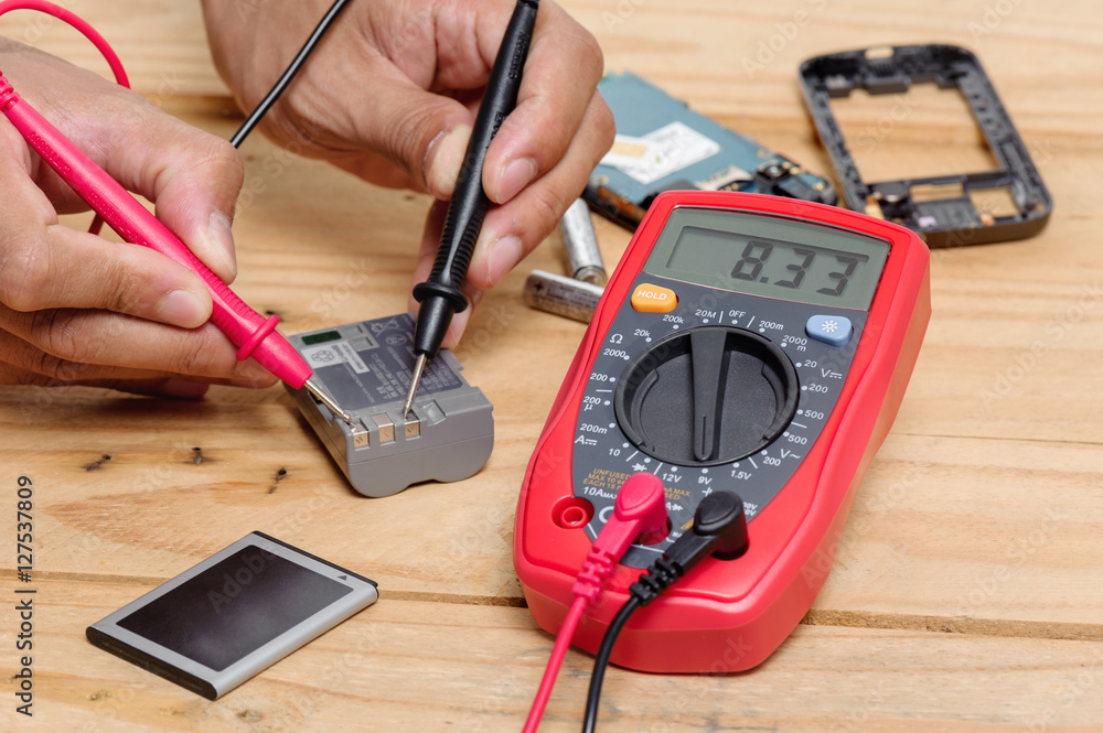 using the multimeter Stock Photo | Adobe Stock