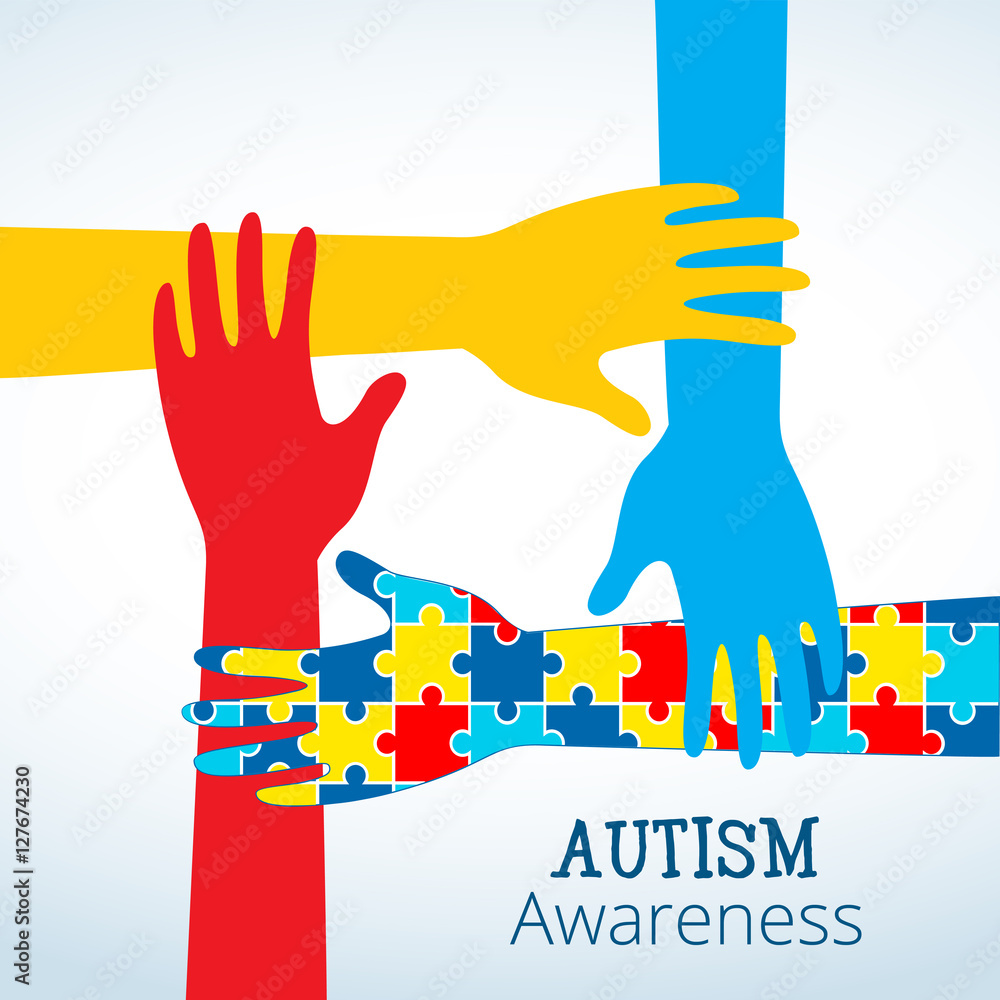 Autism awareness concept with hand of puzzle pieces as symbol of autism ...