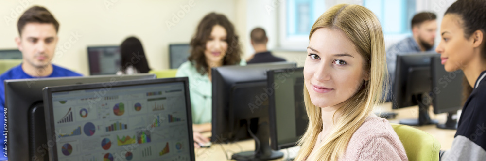 Young woman during computer classes Stock-Foto | Adobe Stock