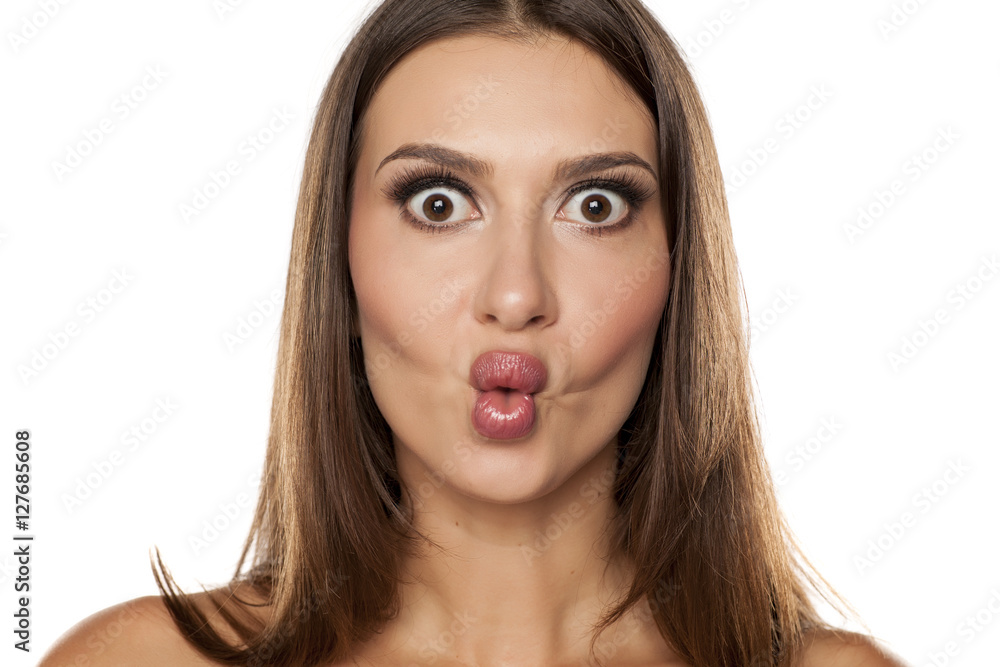Silly young woman making fish face foto de Stock | Adobe Stock