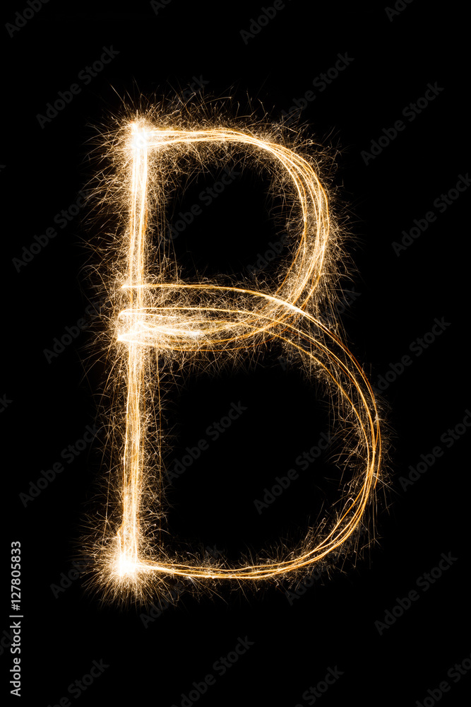 English Letter B from sparklers alphabet on black background. Stock ...
