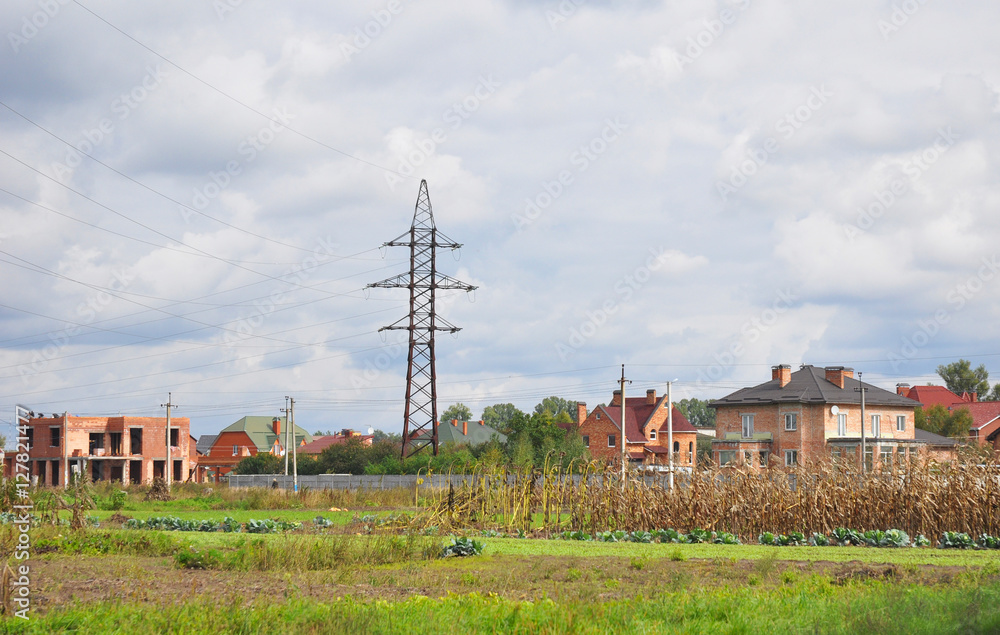 Overhead power line. Living near overhead high voltage transmission ...